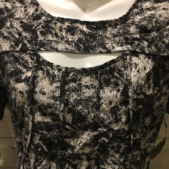 Robbi & Nikki | Tops | Robbi And Nikki Front Cutout Blouse | Poshmark